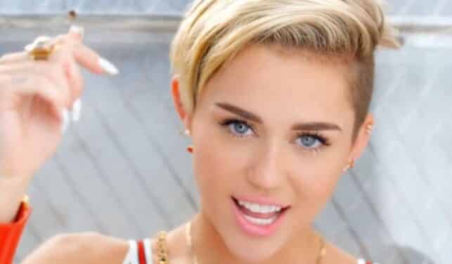 Miley Cyrus Jogs Shirtless And Shows Off Abs